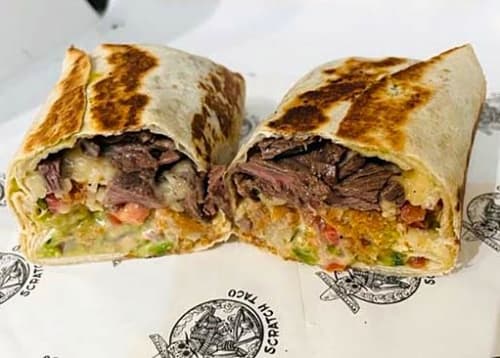 slide 5 of 10. Uploaded merchant gallery slide for Scratch Taco.