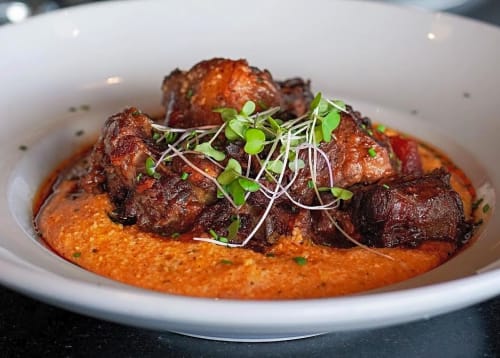 slide 8 of 10. Uploaded merchant gallery slide for KISS Houston.