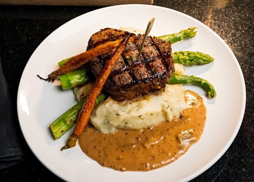 slide 4 of 10. Uploaded merchant gallery slide for KISS Houston.