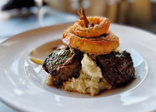 slide 1 of 8. Uploaded merchant gallery slide for The River Bistro.